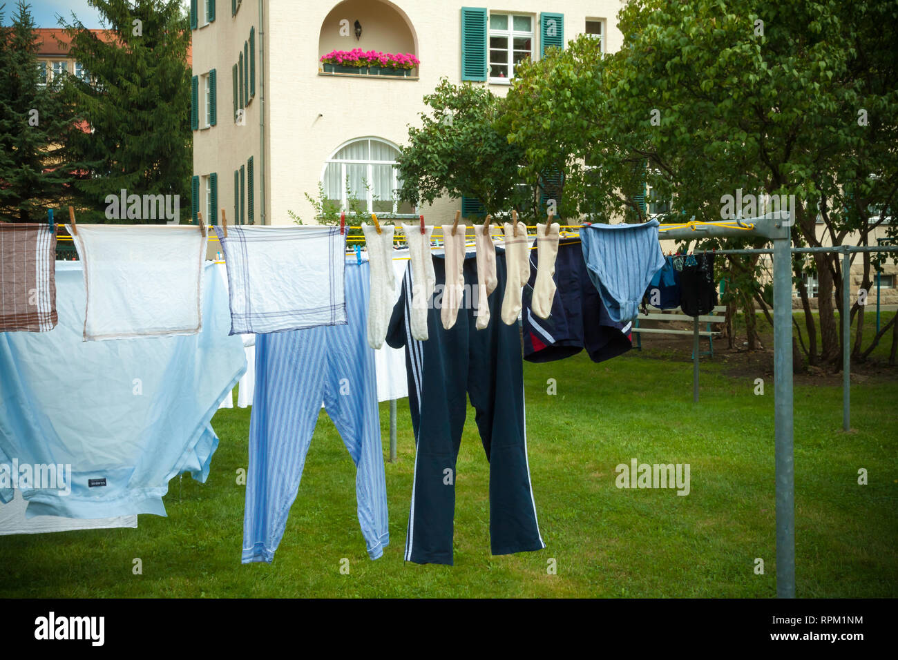Dirty clothes line hi-res stock photography and images - Alamy