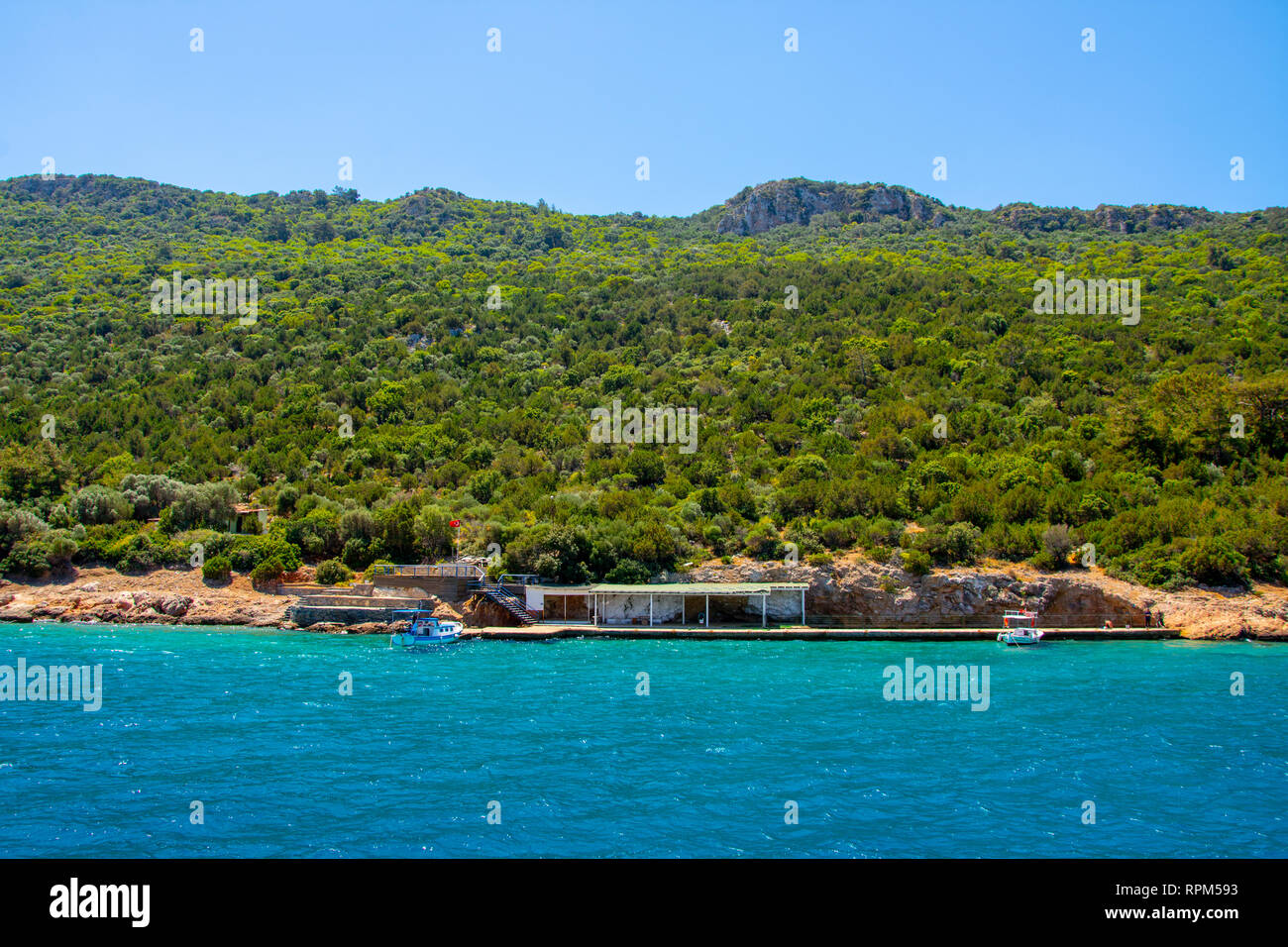 The coastline of the island in city of Bodrum where there is a swimming ...