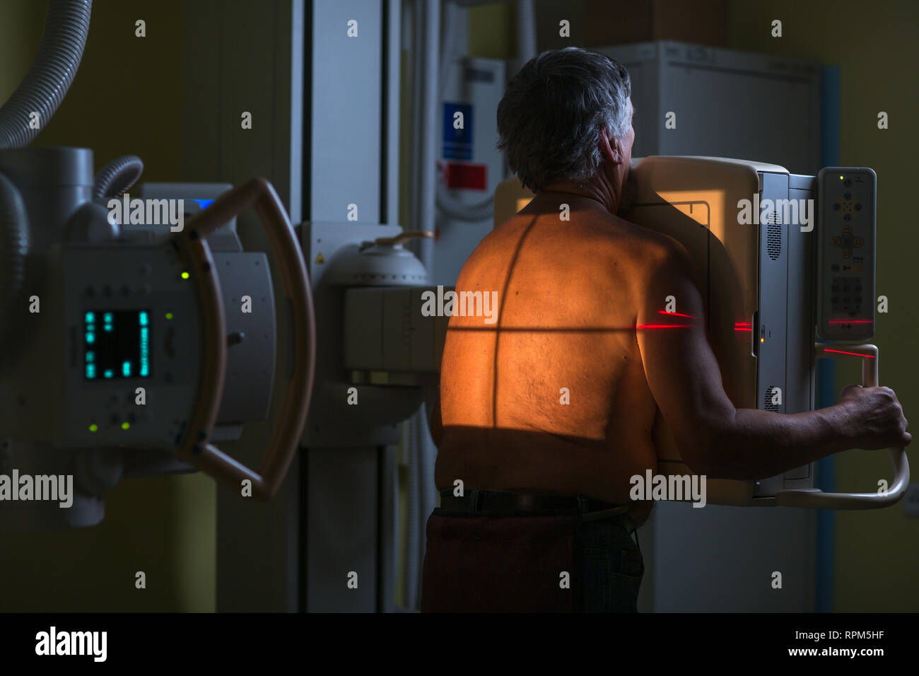 Healthcare Concept - Senior male patient undergoing an X-ray ...