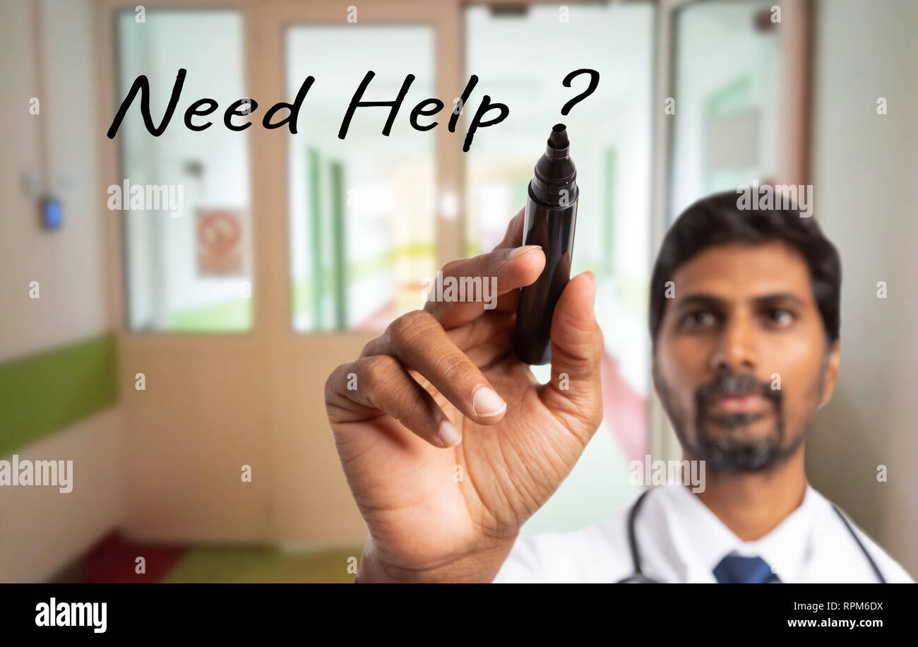 Indian male doctor or medic offering medical support with need help ...