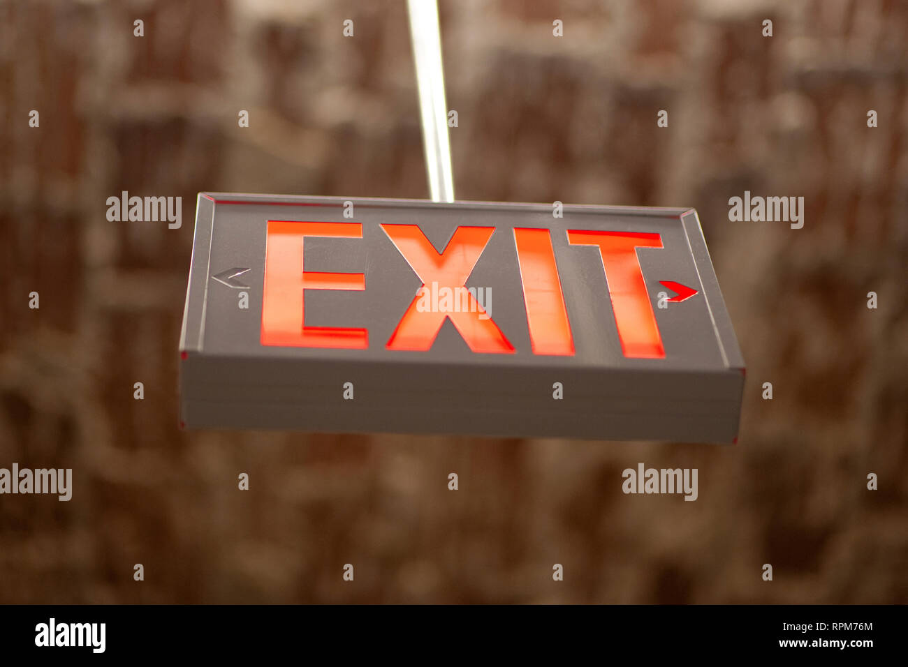 Hanging Exit Sign Stock Photo - Alamy