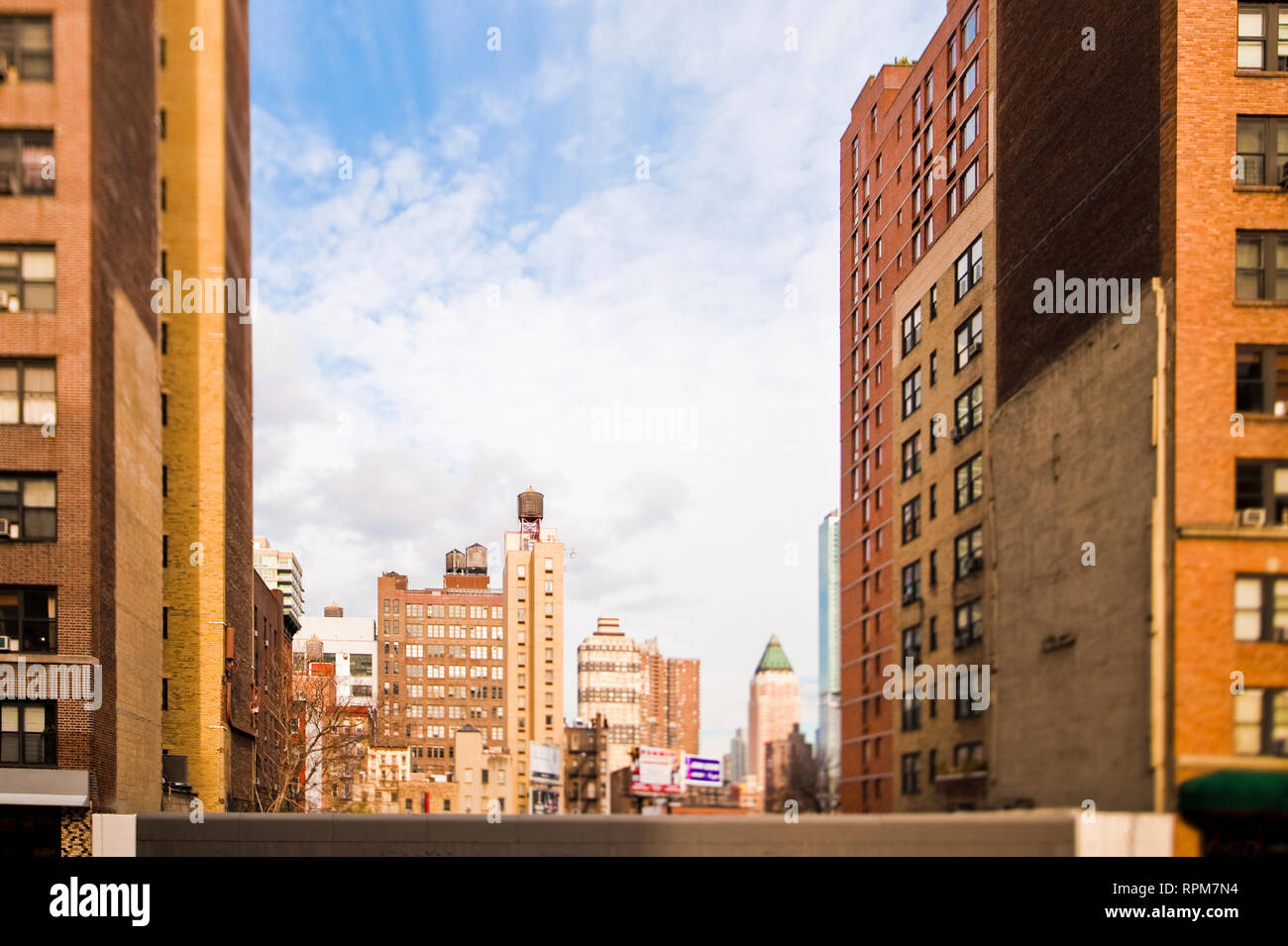 Cityscape Seen Between Buildings Stock Photo - Alamy