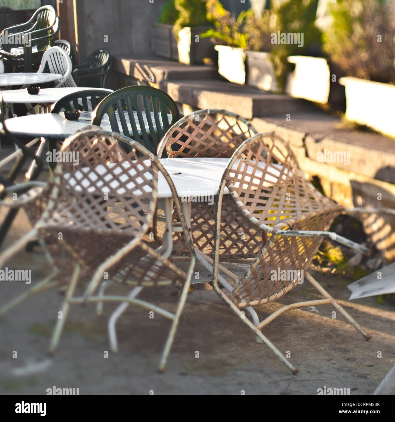 Chairs Leaning Up Against a Table Stock Photo - Alamy