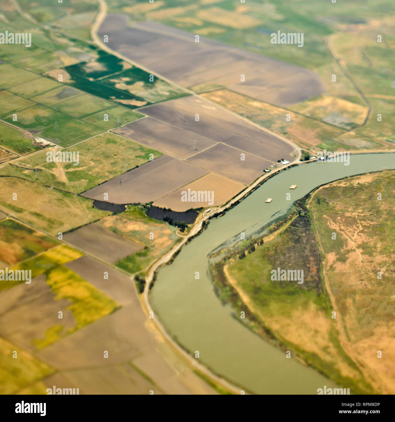 Aerial View of a River Passing Through Farmland Stock Photo - Alamy