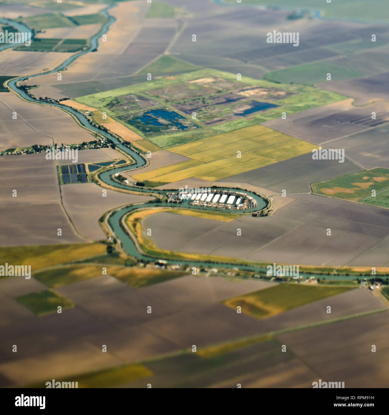 Aerial View of a River Passing Through Farmland Stock Photo - Alamy