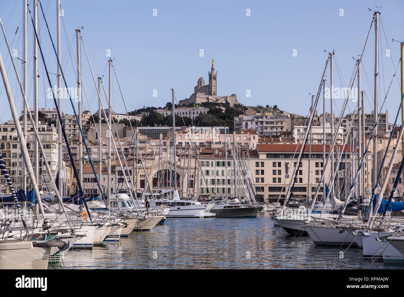 The skyline of Marseilles, France and the marina full of yachts in ...
