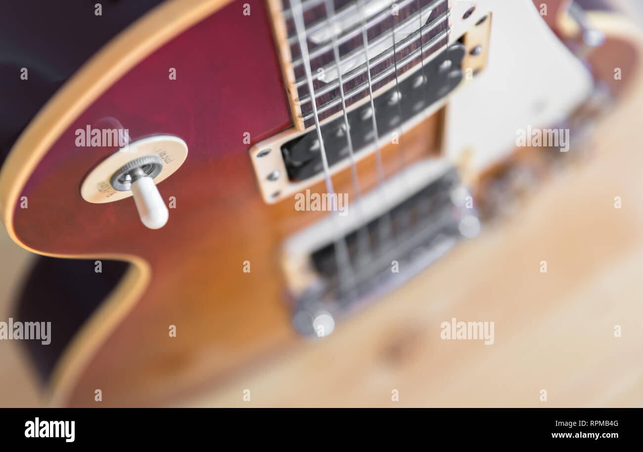 Six-string electric guitar closeup. Vintage style. Selective focus ...