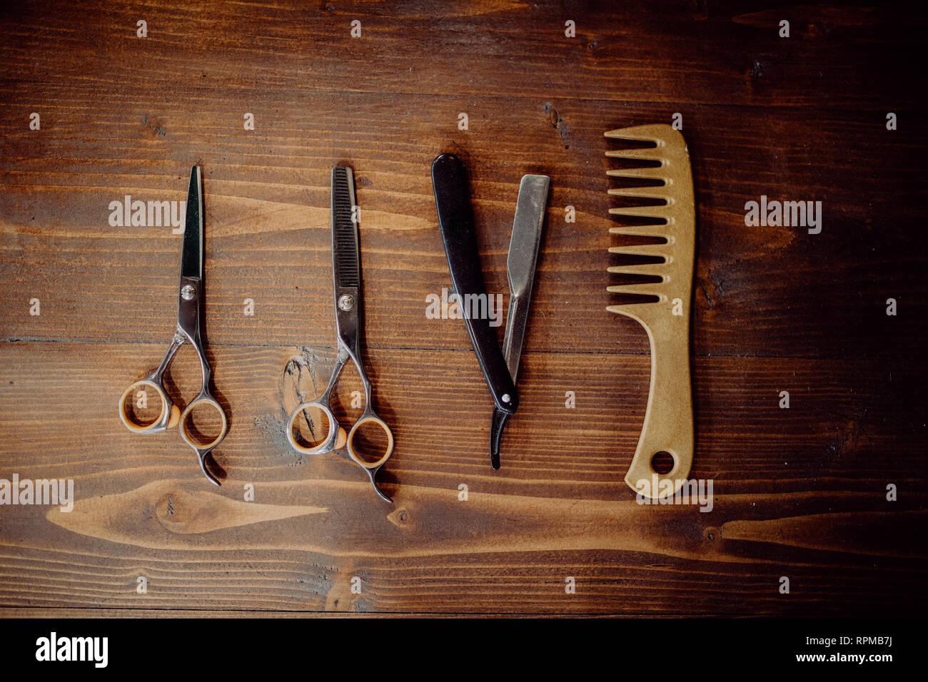 Vintage tools of barber shop on wooden background Stock Photo - Alamy