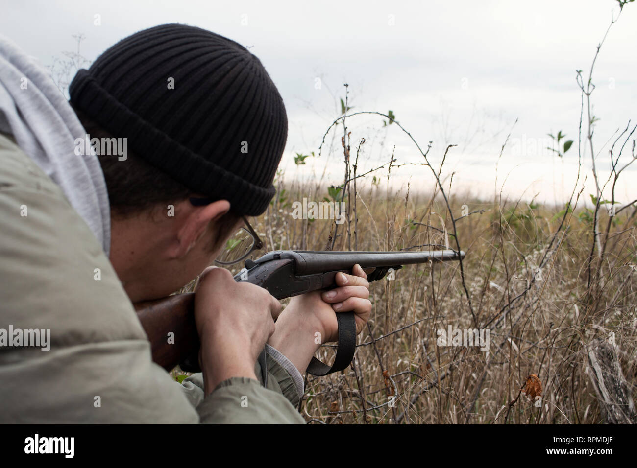 Hunter With Old Hunting Riffle Waiting for Pray in the Woods Stock ...