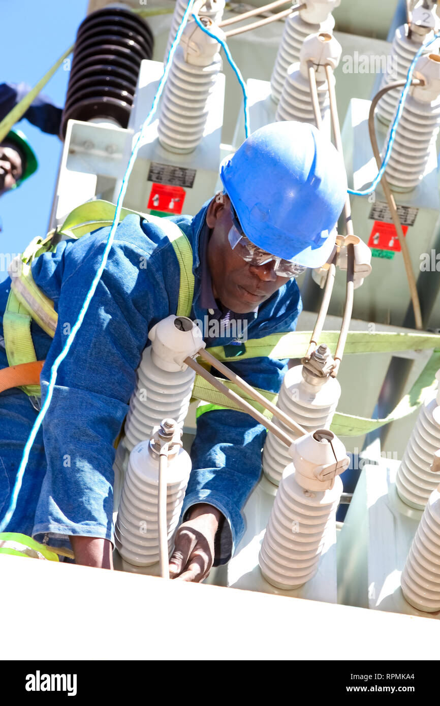Working electricity lines africa hi-res stock photography and images ...