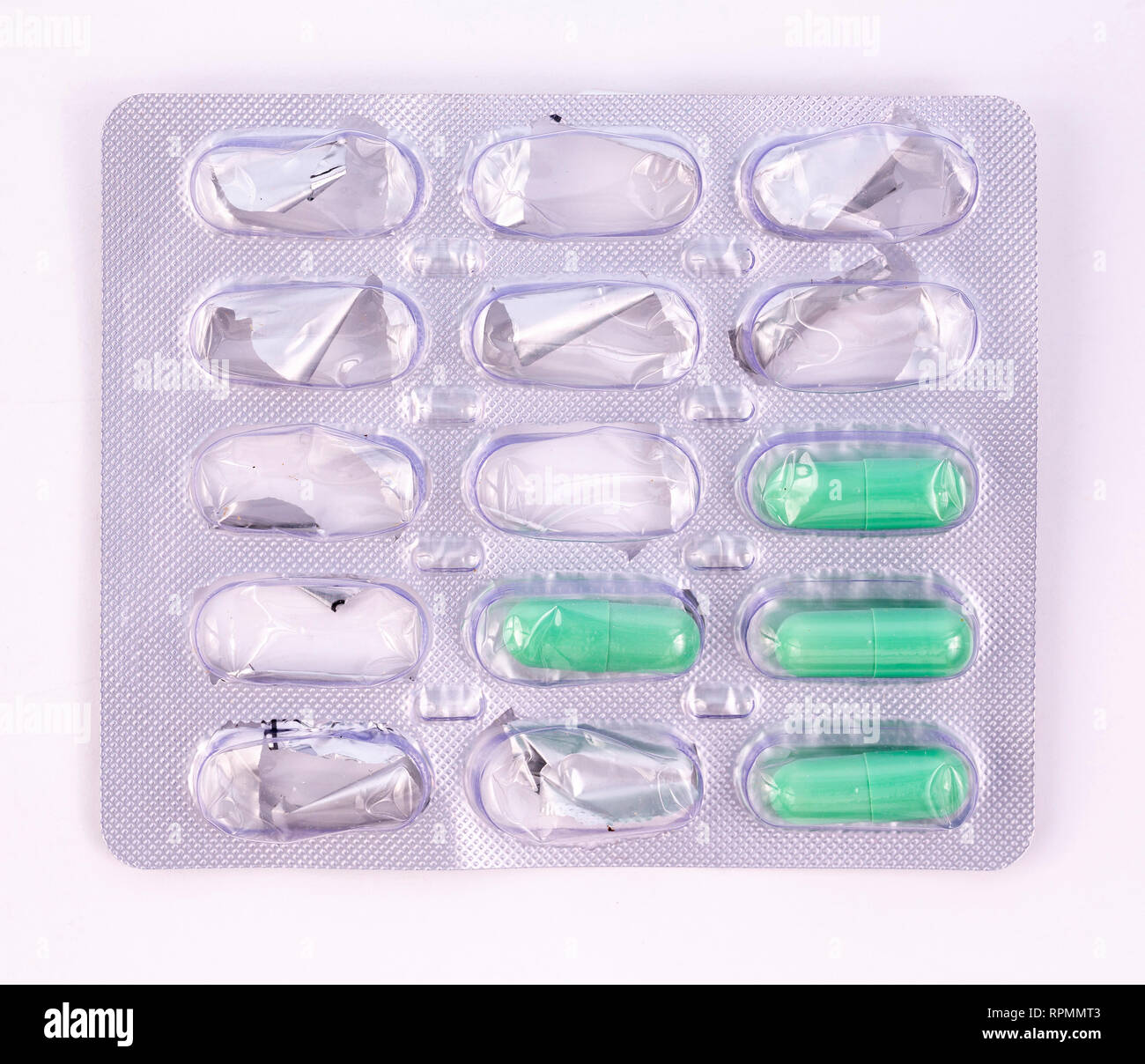 Used green pills in silver plastic pack - blister. Global ...