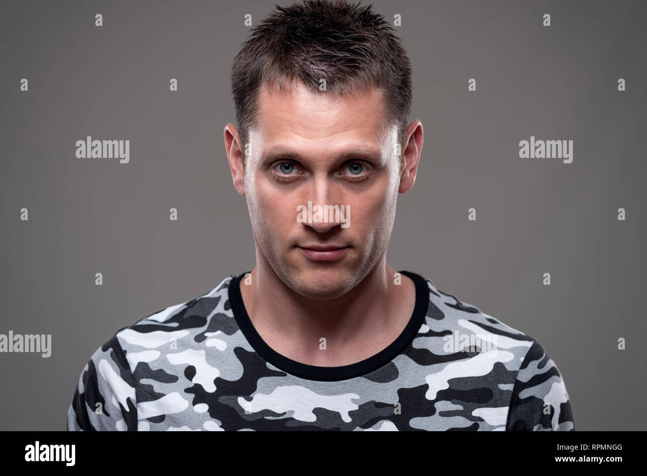 Moody face with attitude staring hi-res stock photography and images ...