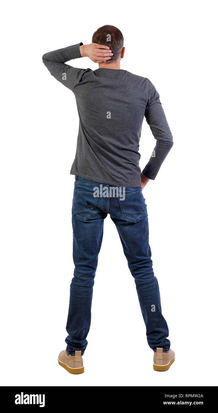 Back view of man in jeans. Standing young guy. Rear view people ...