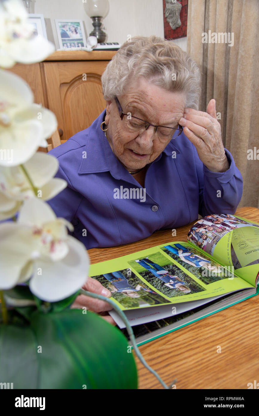 old woman reading book Stock Photo - Alamy
