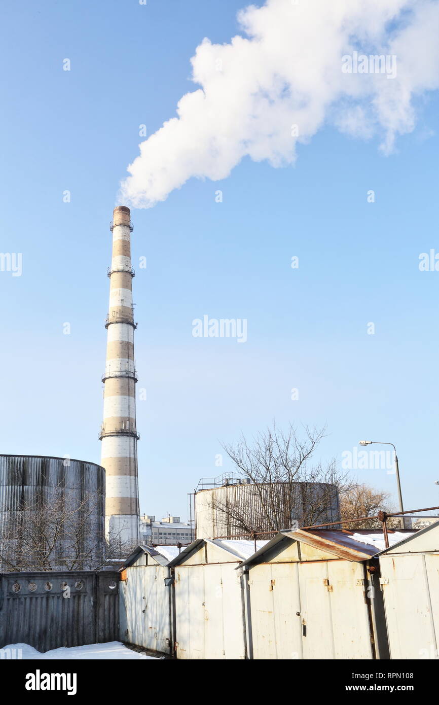 Smoke puffing from utility pipe in Kiev on chilly winter day, as soviet ...