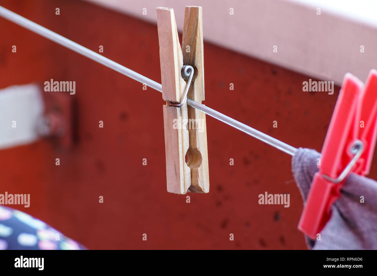 Pegs on rope hi-res stock photography and images - Alamy