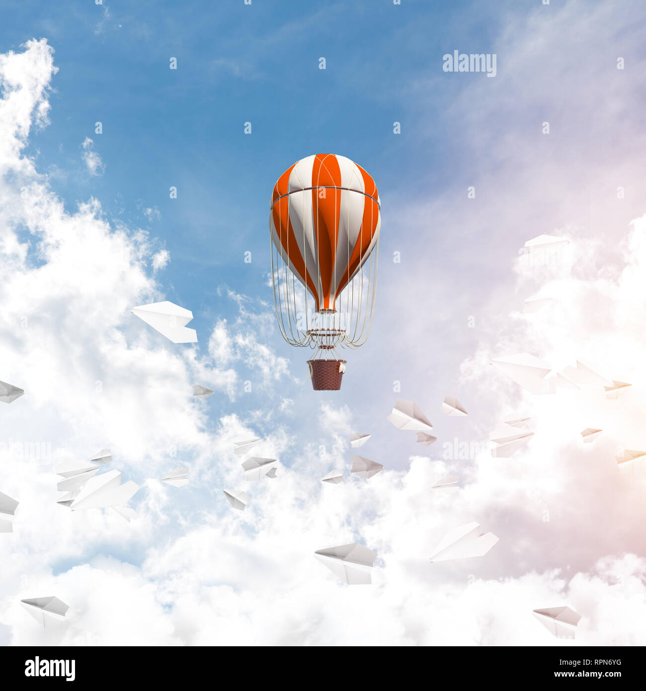 Flying hot air balloon in the air Stock Photo - Alamy