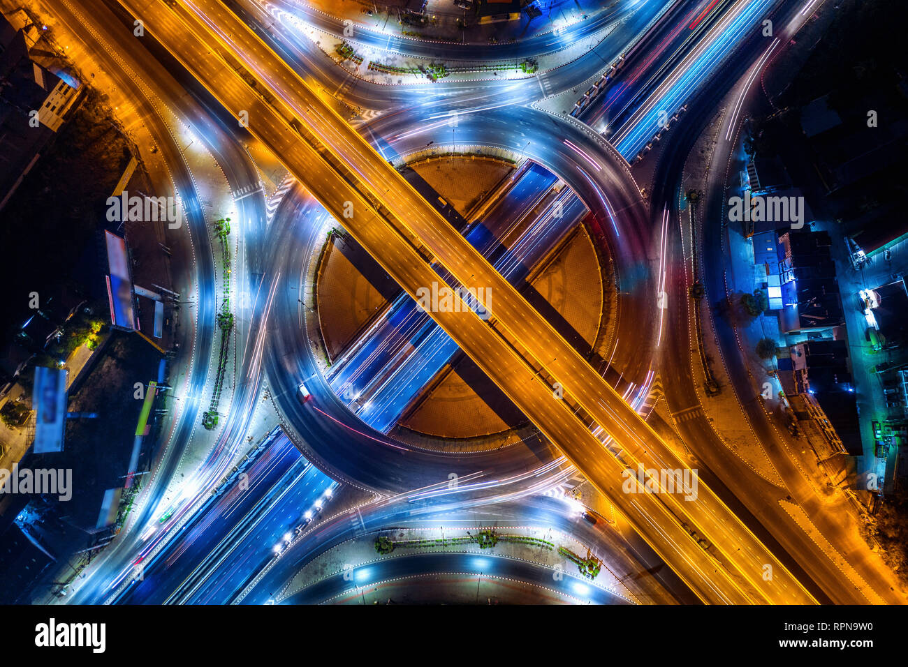 Aerial view of traffic in roundabout and highway at night Stock Photo ...