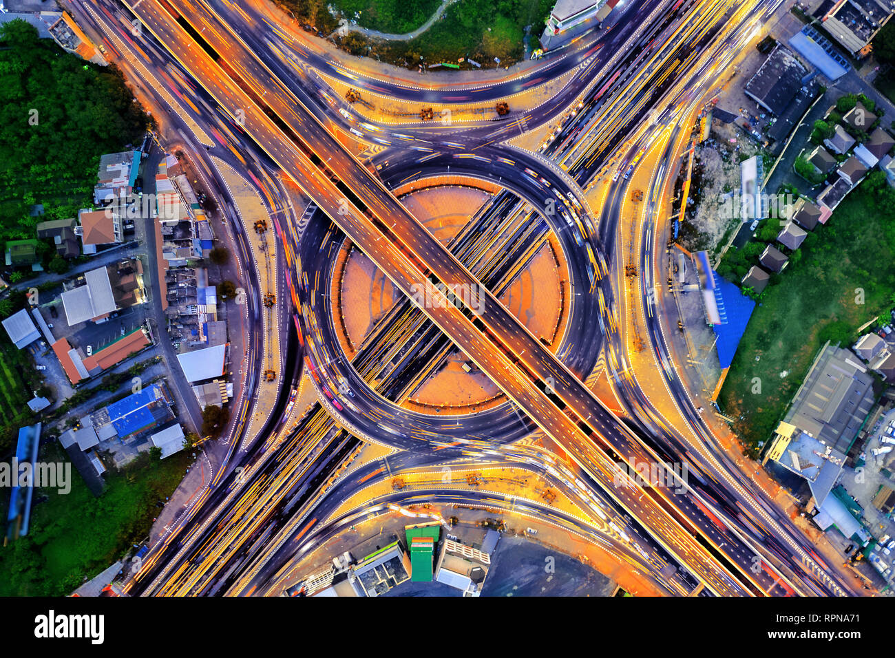Aerial view of traffic in roundabout and highway at night Stock Photo ...