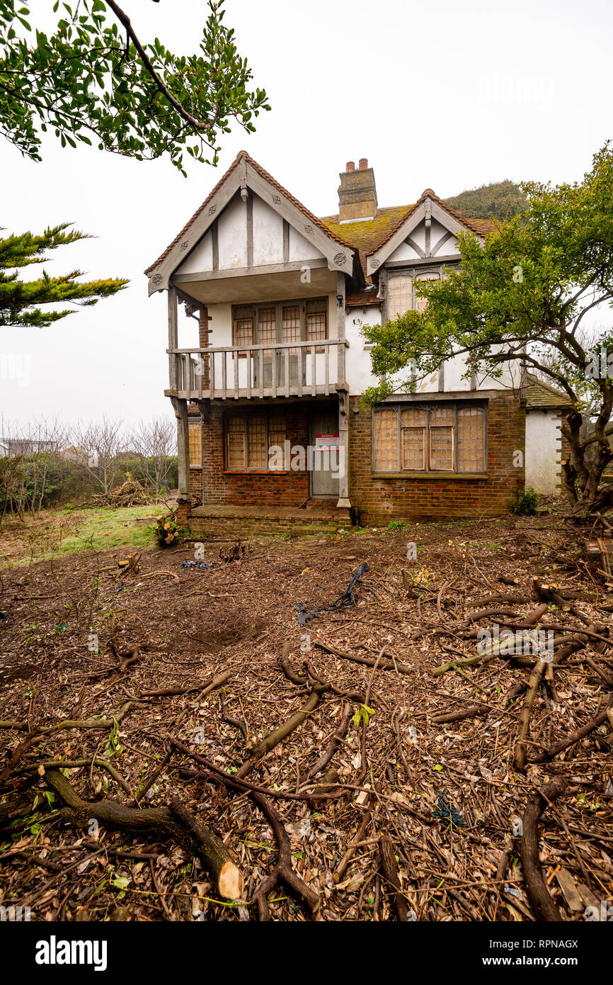 boarded up 1930's Tudor detached house Stock Photo - Alamy