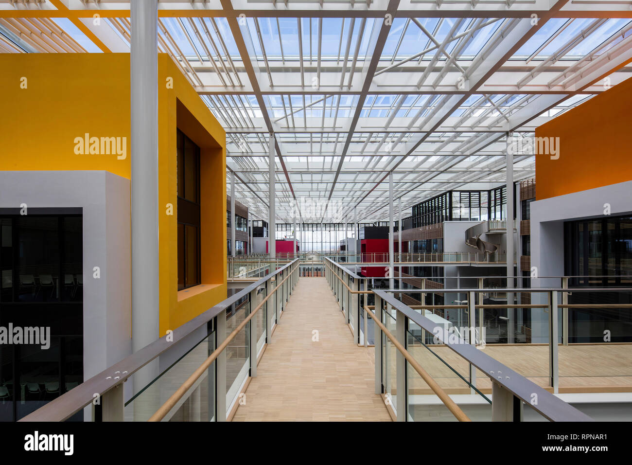 Bridge with colorful rectangular volumes and glass roof. Research ...
