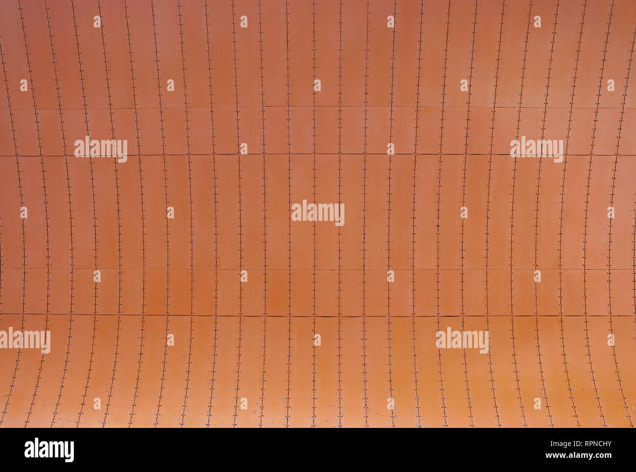 texture background metal surface evenly divided into rectangles reddish ...