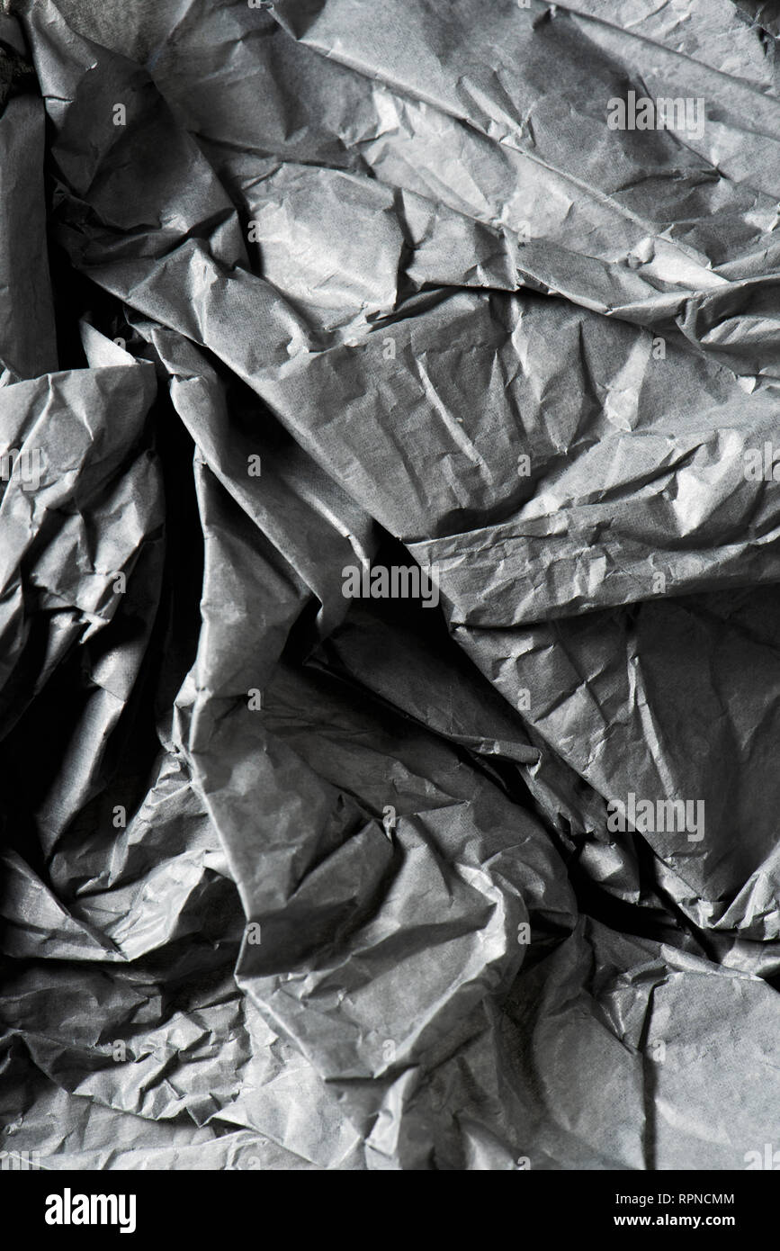 background made of a closeup of a crumpled gray paper Stock Photo - Alamy