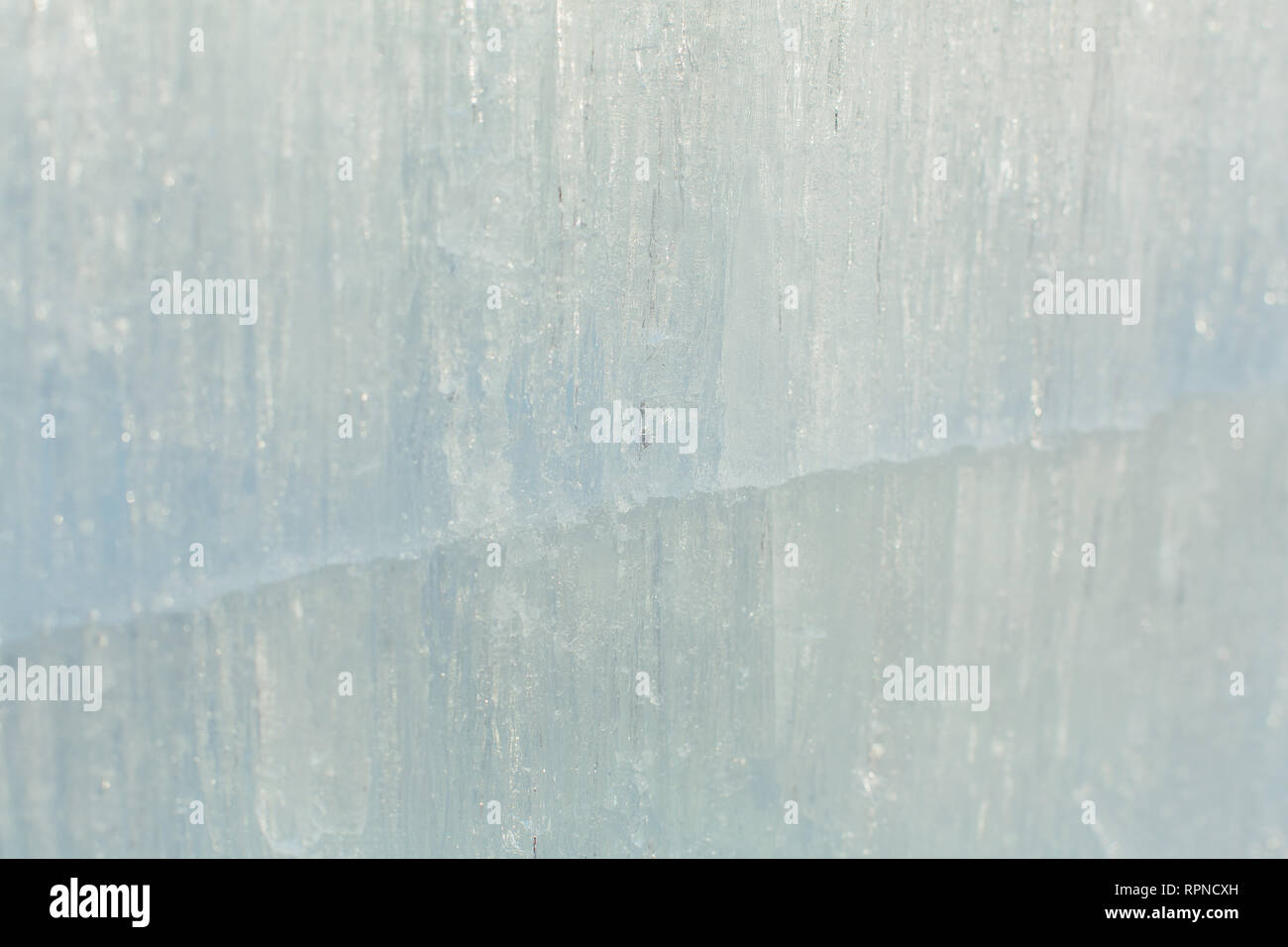 Ice bricks with bubbles of air inside. Abstract ice crystal texture ...