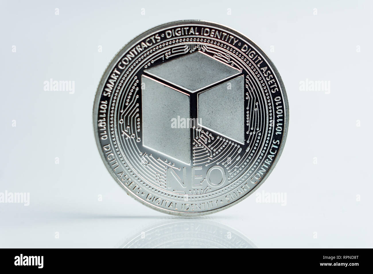 NEO. Crypto currency silver coin, Macro shot of NEO coin isolated on ...