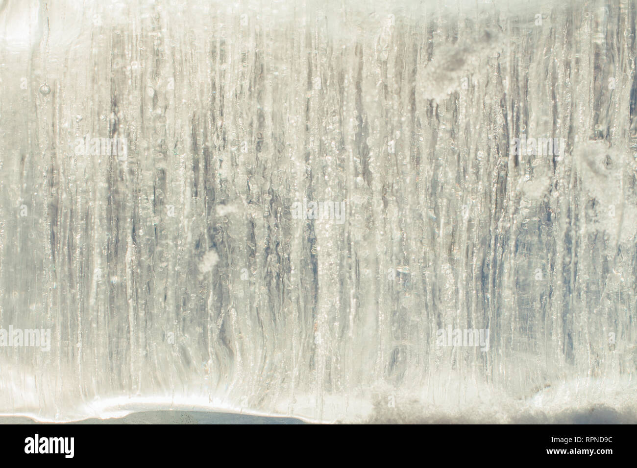 Ice bricks with bubbles of air inside. Abstract ice crystal texture ...