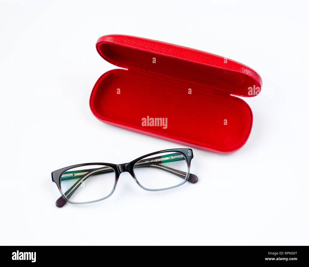 Glasses and red case on a white background Stock Photo - Alamy