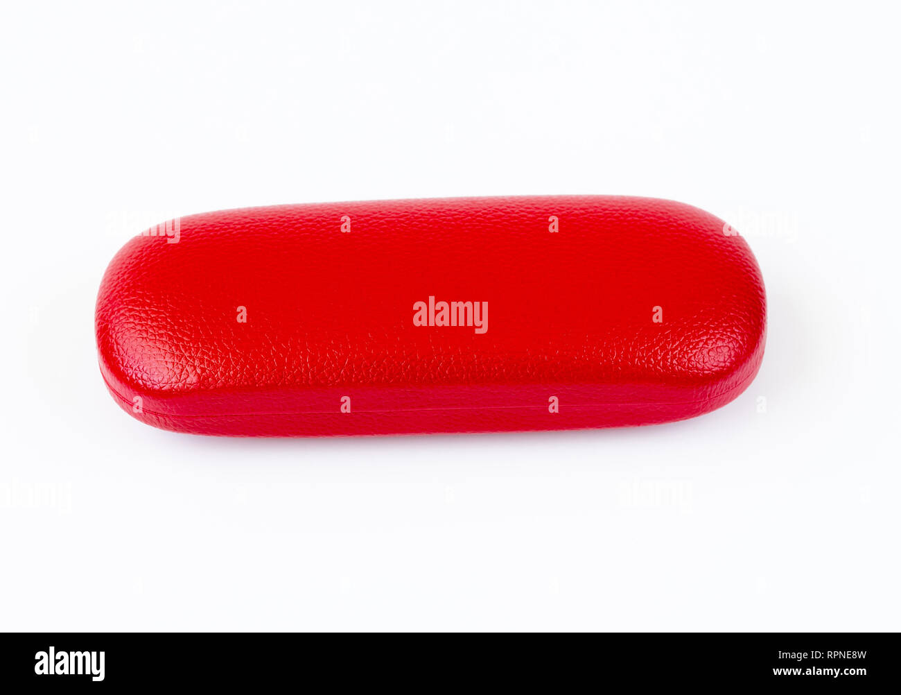 Closed red glasses case on white background Stock Photo - Alamy