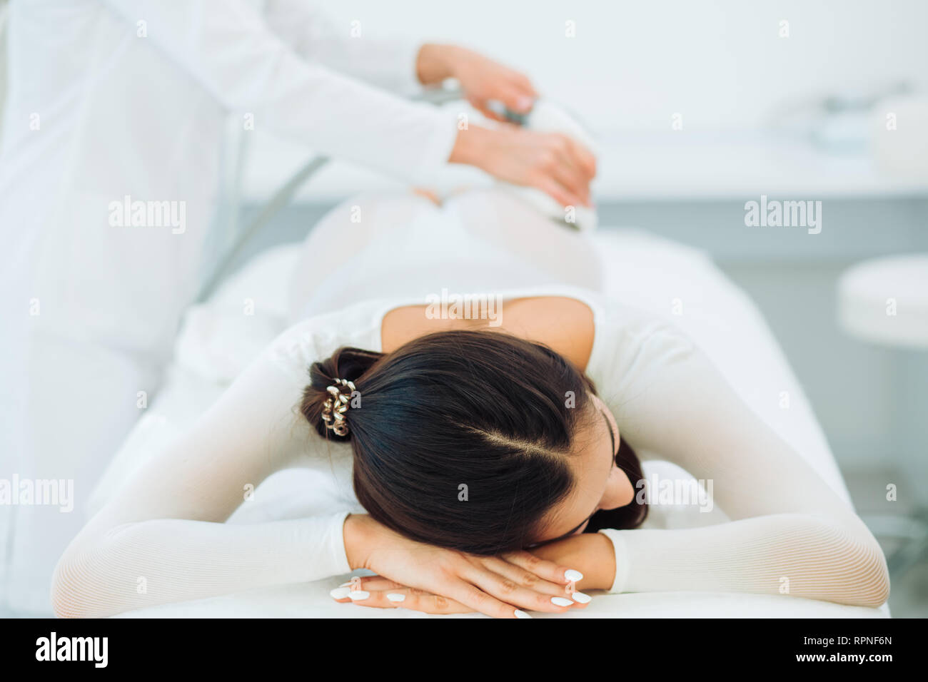 Close Up Shot Of Therapist Beautician Makes Lpg Massage Treatment To