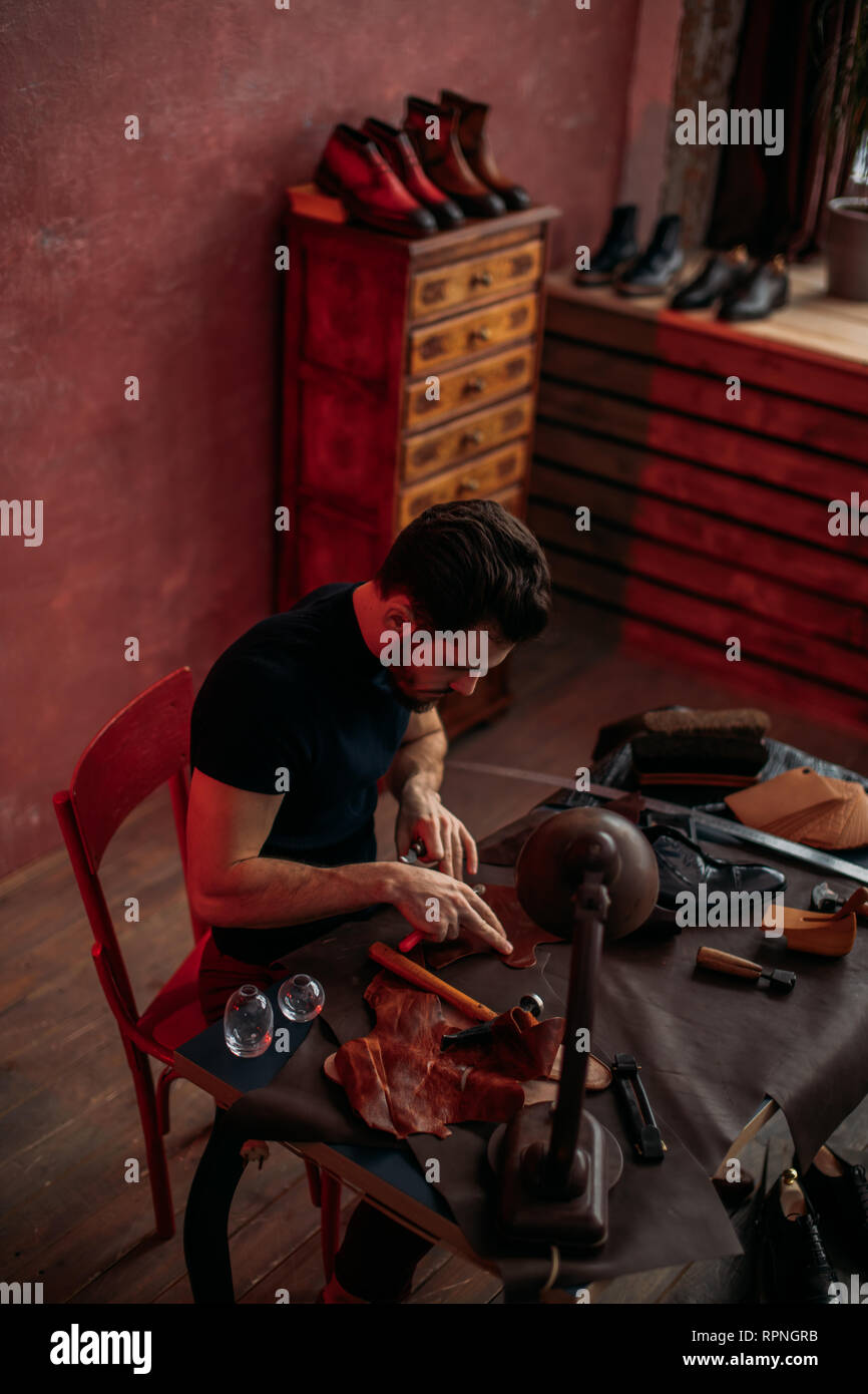 Craftsman work shoemaker mending shoes hi-res stock photography and ...
