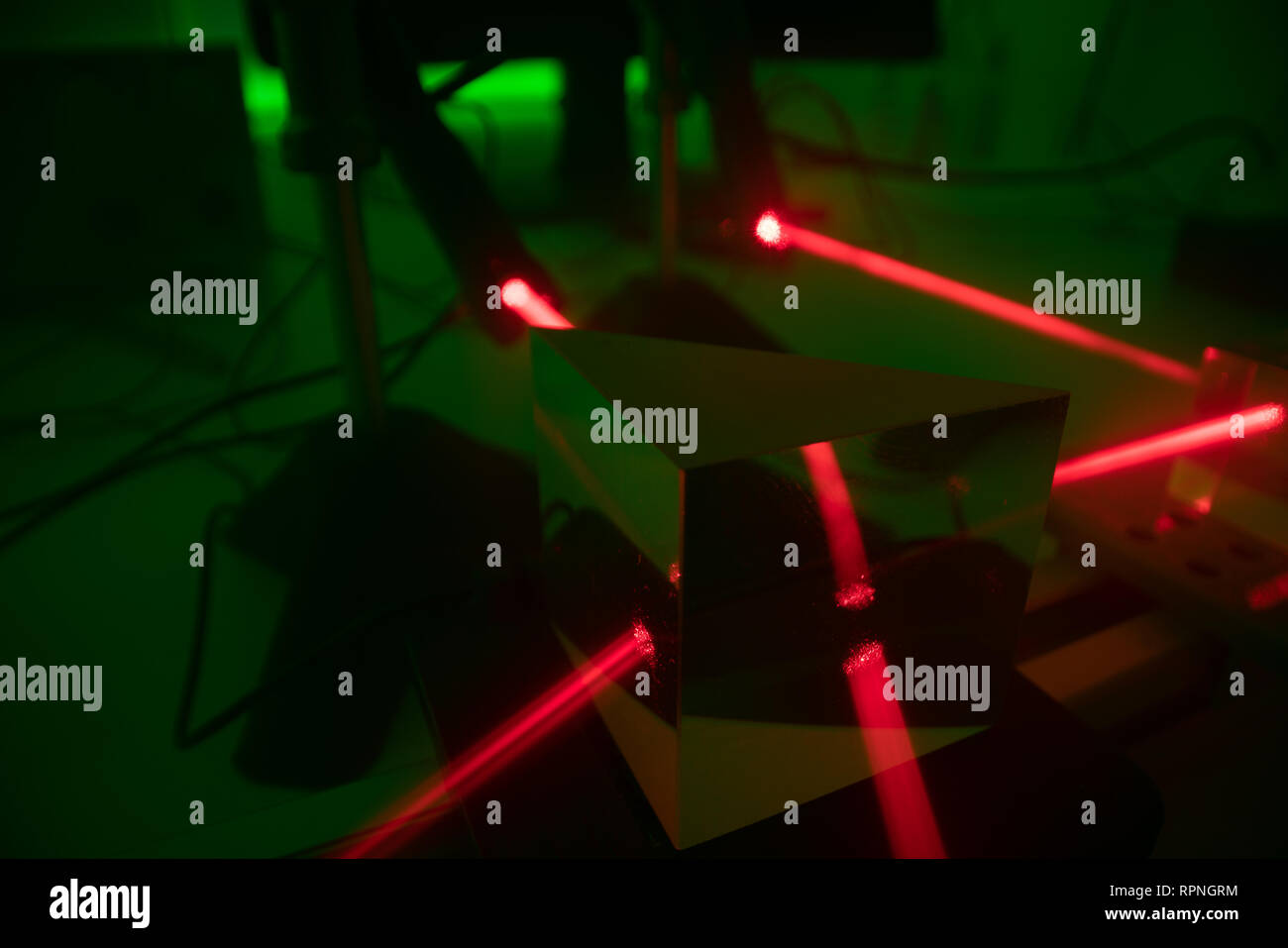 Experiment with a red laser in a physics lab Stock Photo - Alamy