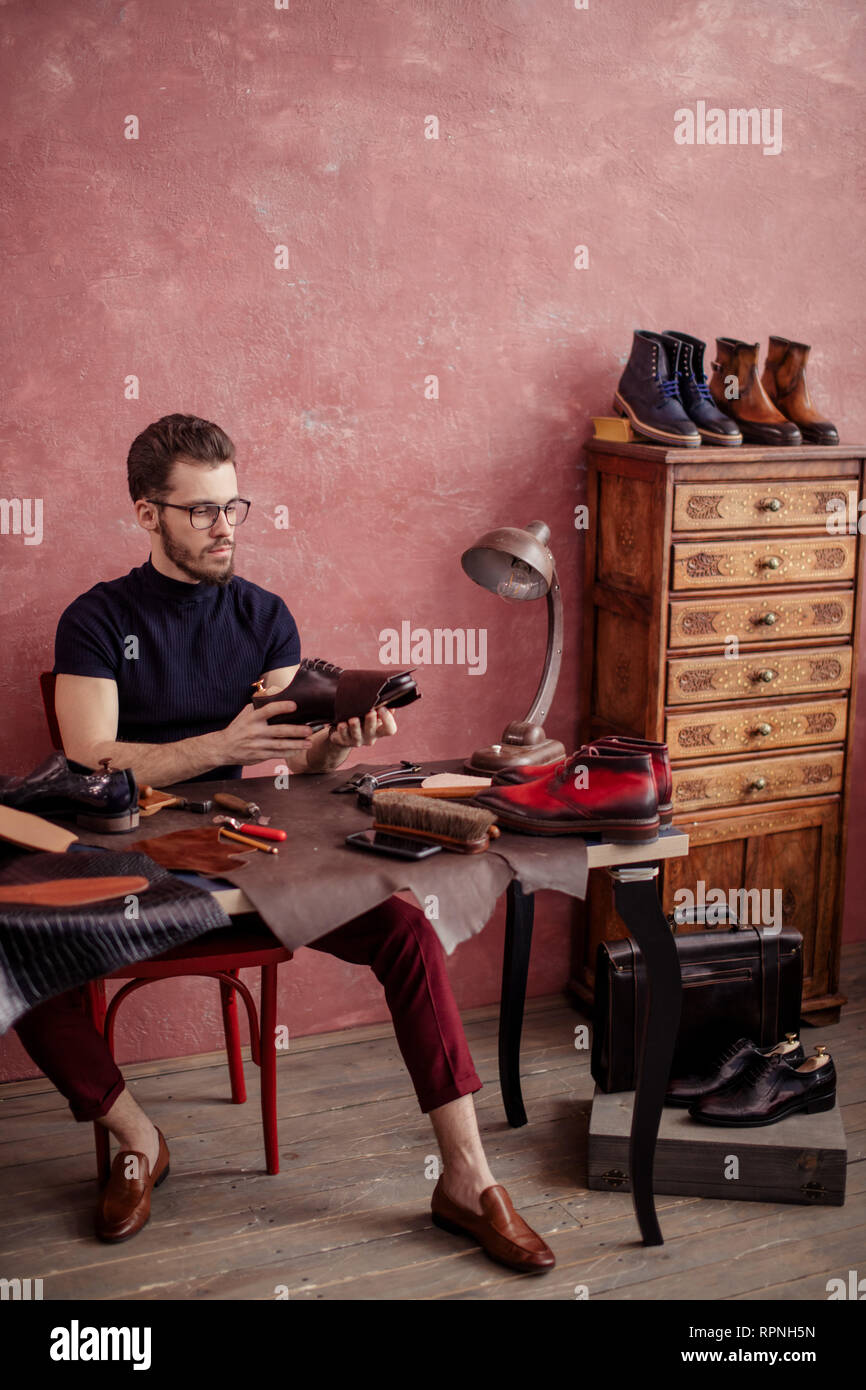 shoe designer developing his own shoes. full length photo Stock Photo ...