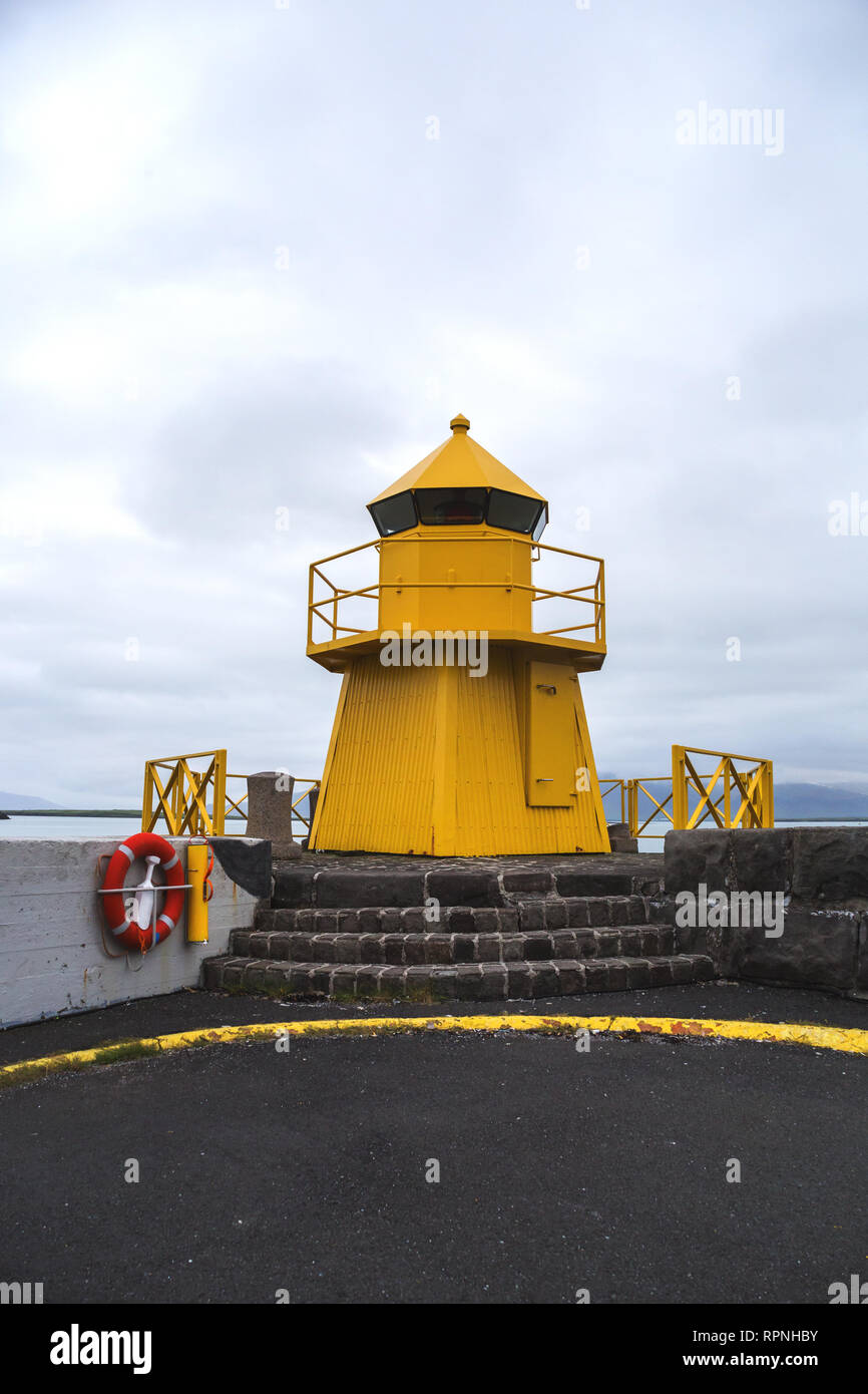 Yellow lighthouse on harbor in Reykjavik,Icleand Stock Photo - Alamy