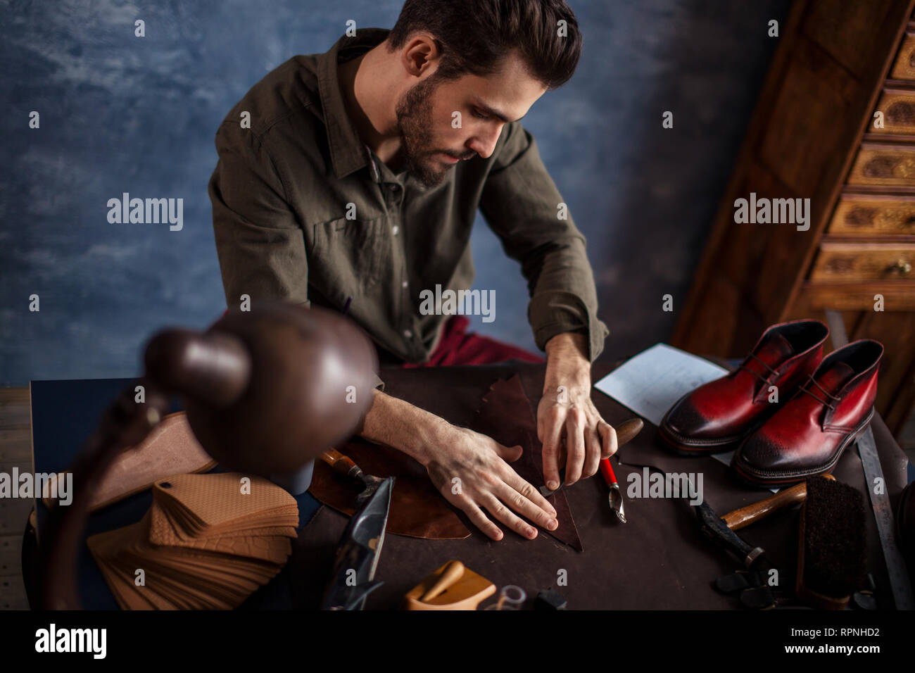 Shoe factory worker using hi-res stock photography and images - Alamy