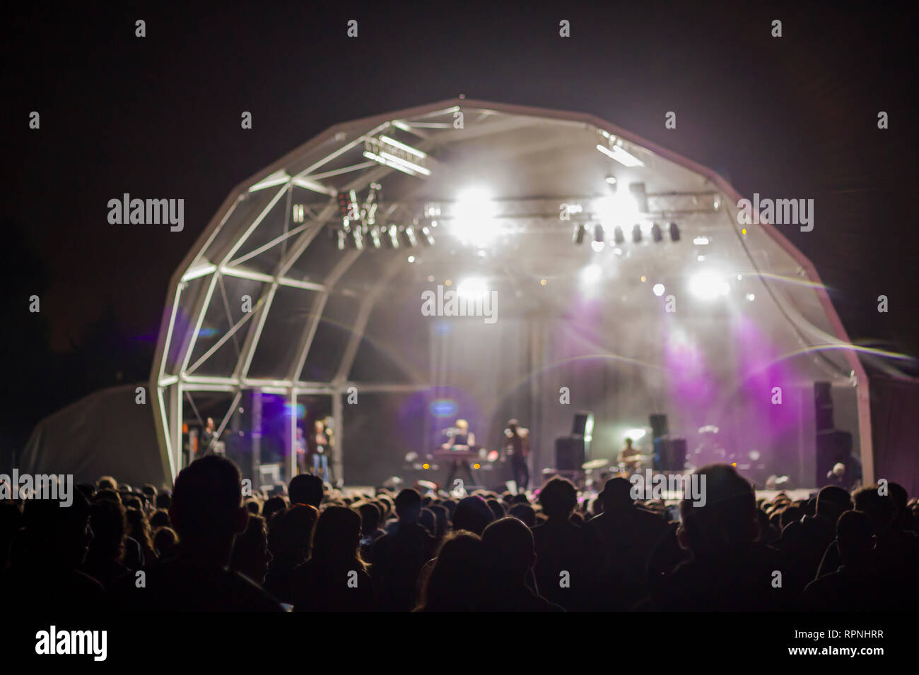 Crowd at festival at night Stock Photo - Alamy