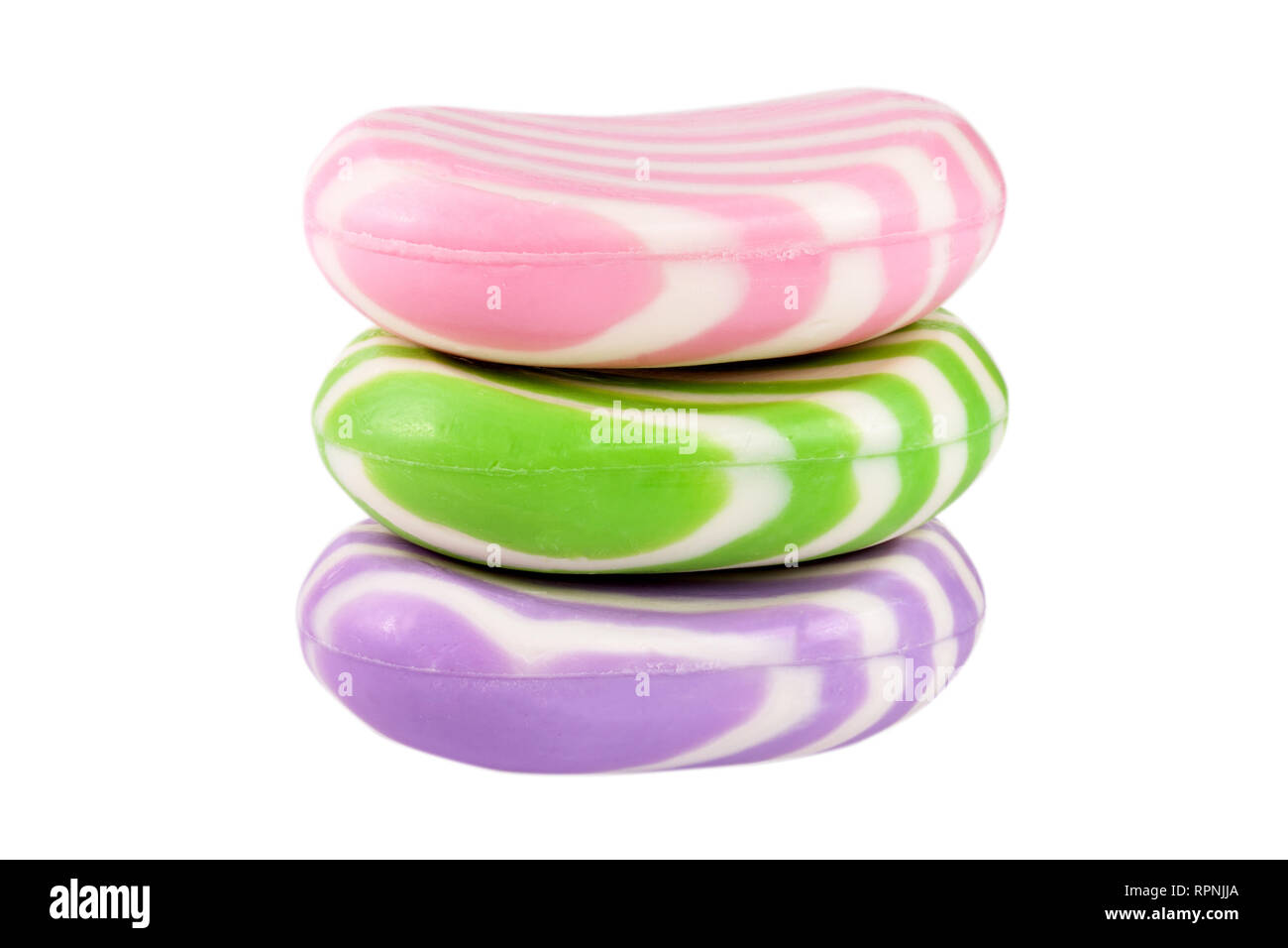 Three multi-colored striped soaps isolated on white background Stock ...