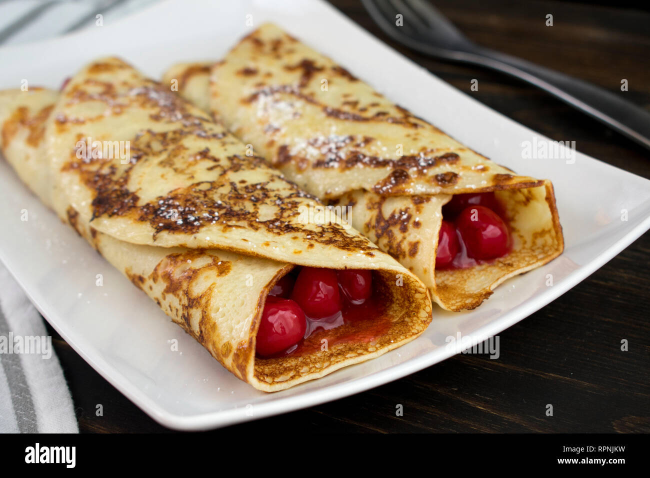 Cherry Filled Crepes Stock Photo - Alamy