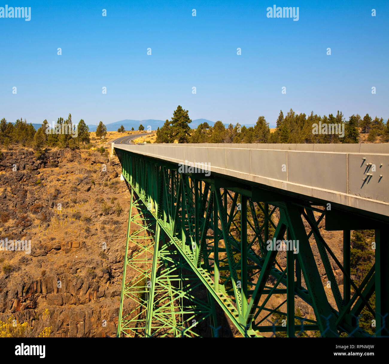 Truss Bridge and Rocky Cliff Face Stock Photo - Alamy