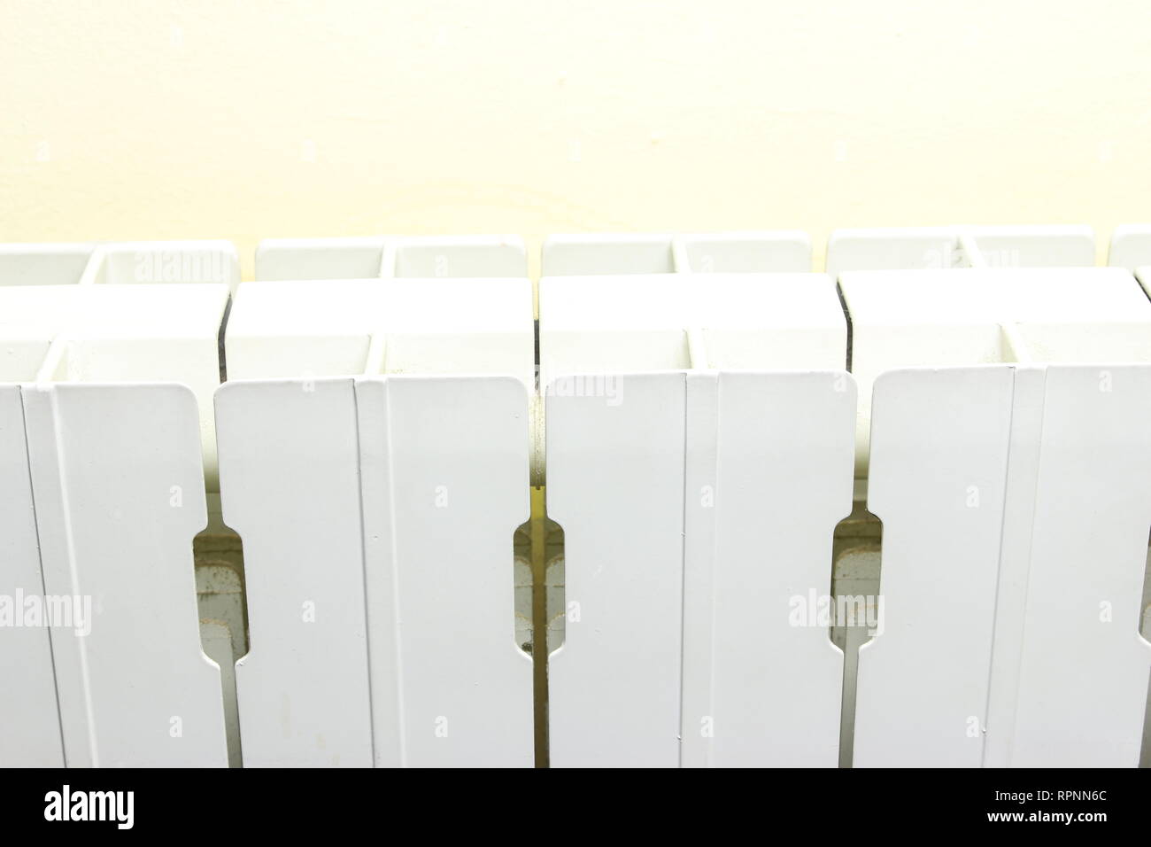 Close up of the upper part of the radiator, in white color aluminum ...