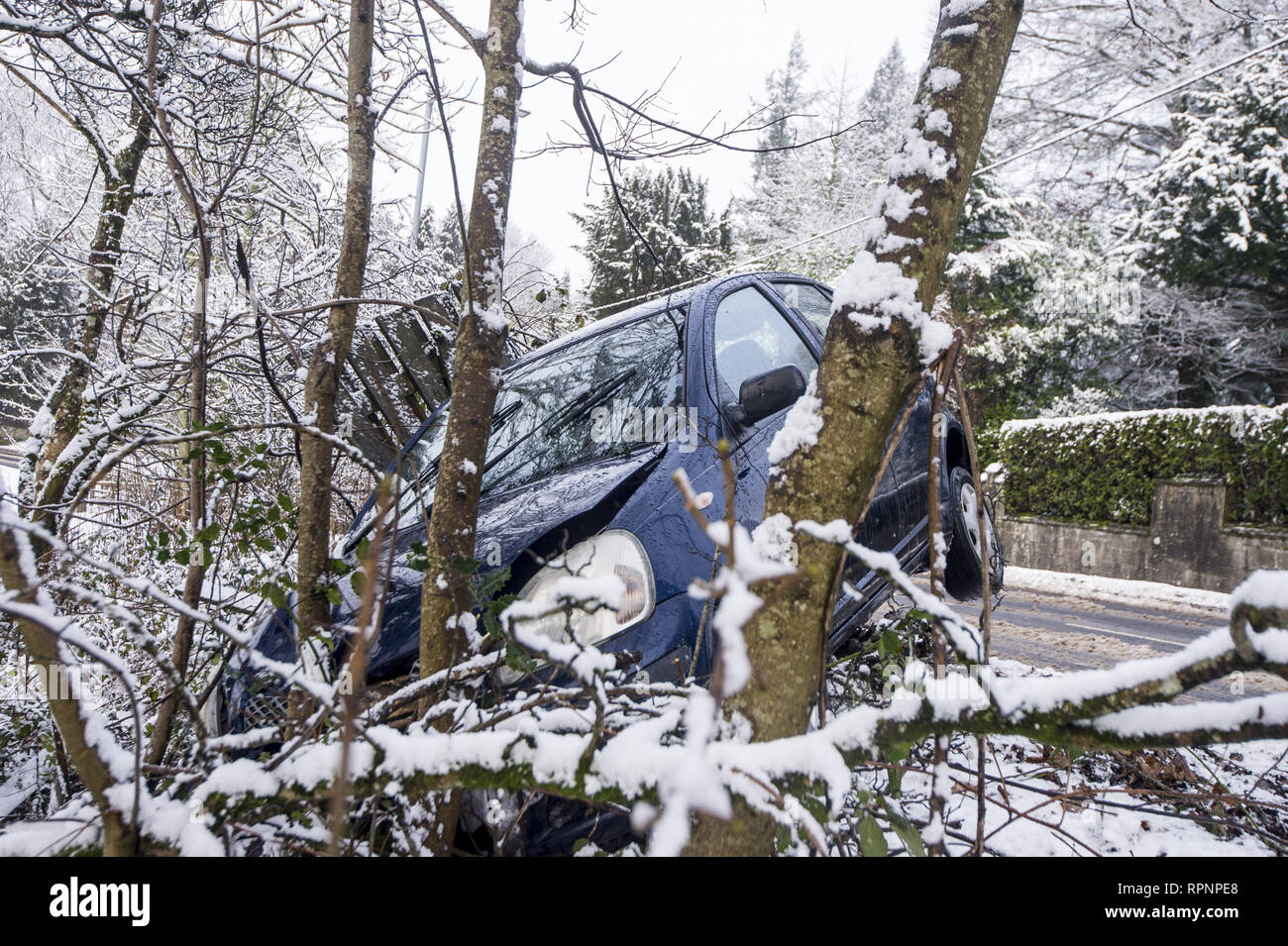 A car is seen crashed in Callander as Scotland is decended into "Chilly ...