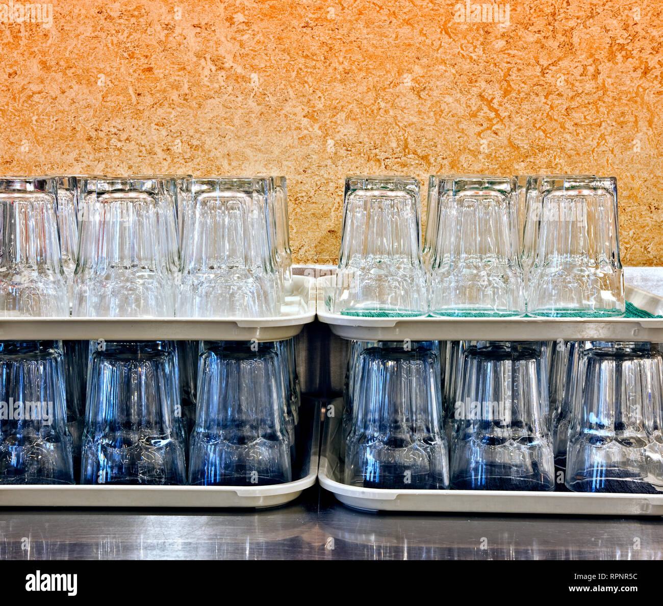 Stacked Glasses in a Cafeteria Stock Photo - Alamy