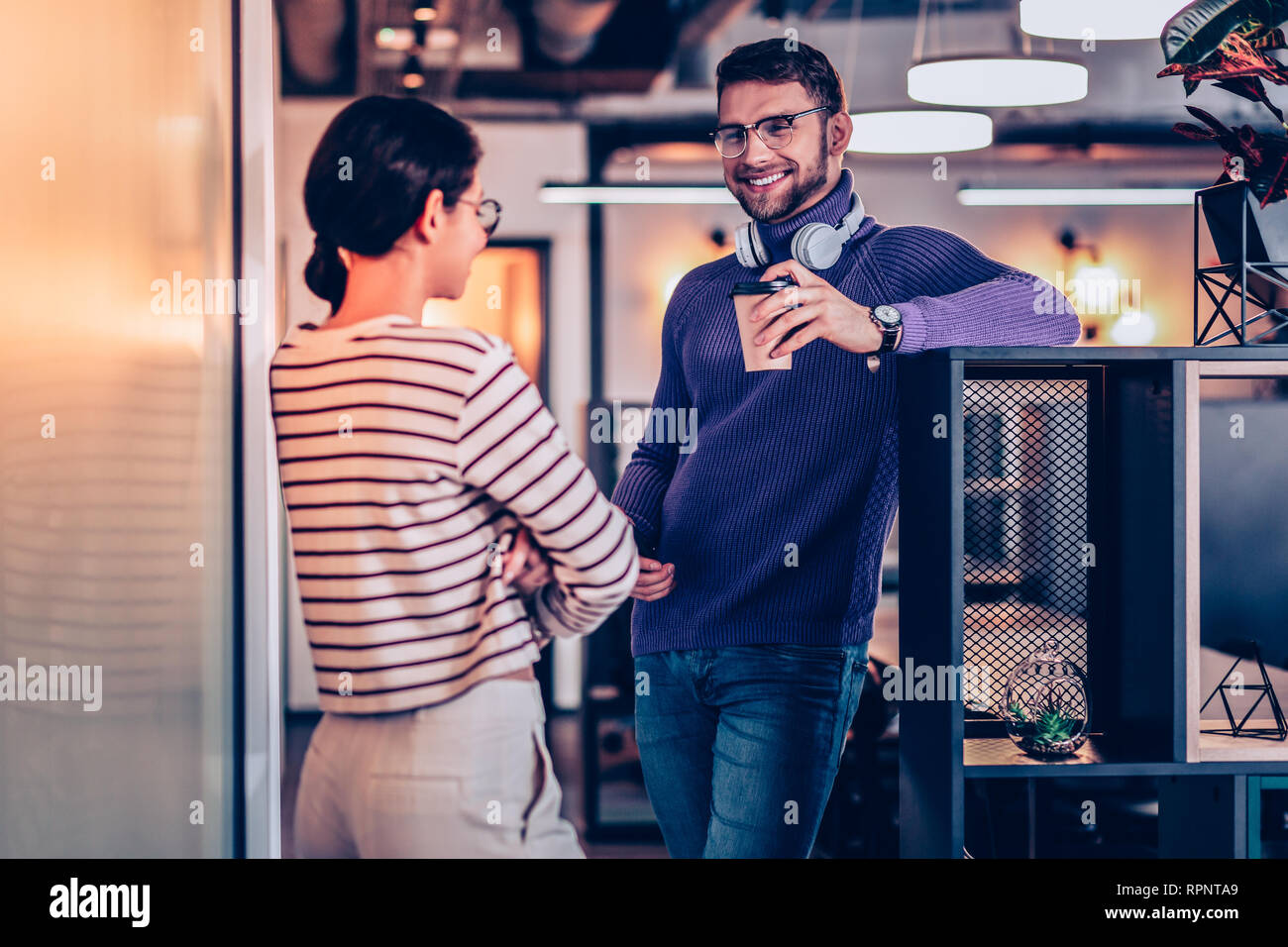 Cheerful friends having break coffee hi-res stock photography and ...