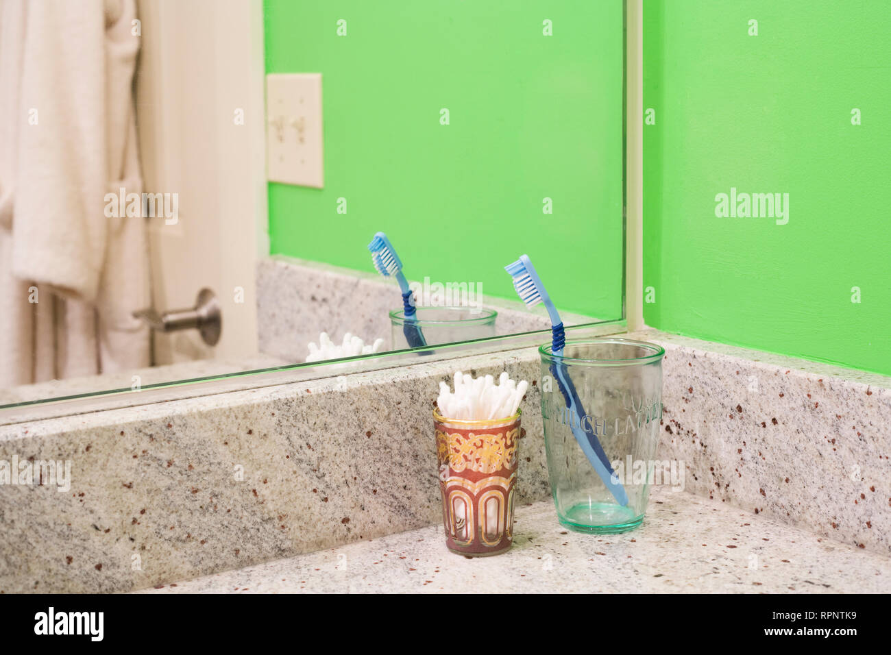 Toothbrush and Cotton Swabs Stock Photo - Alamy