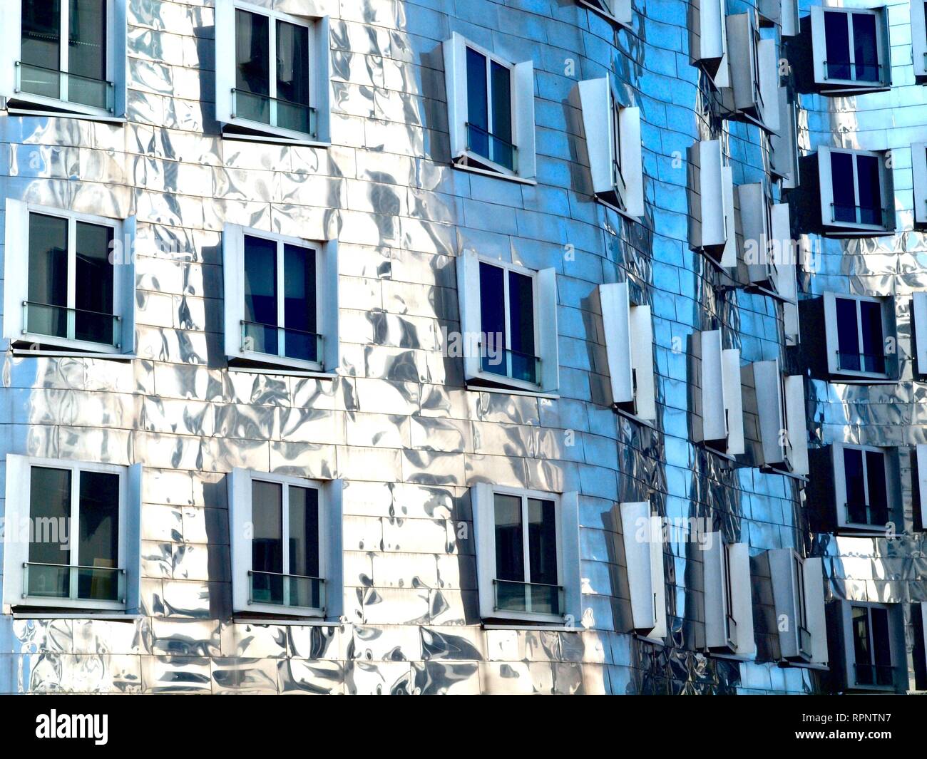Silver Gehry building in Duesseldorf at the Media harbor, interesting ...