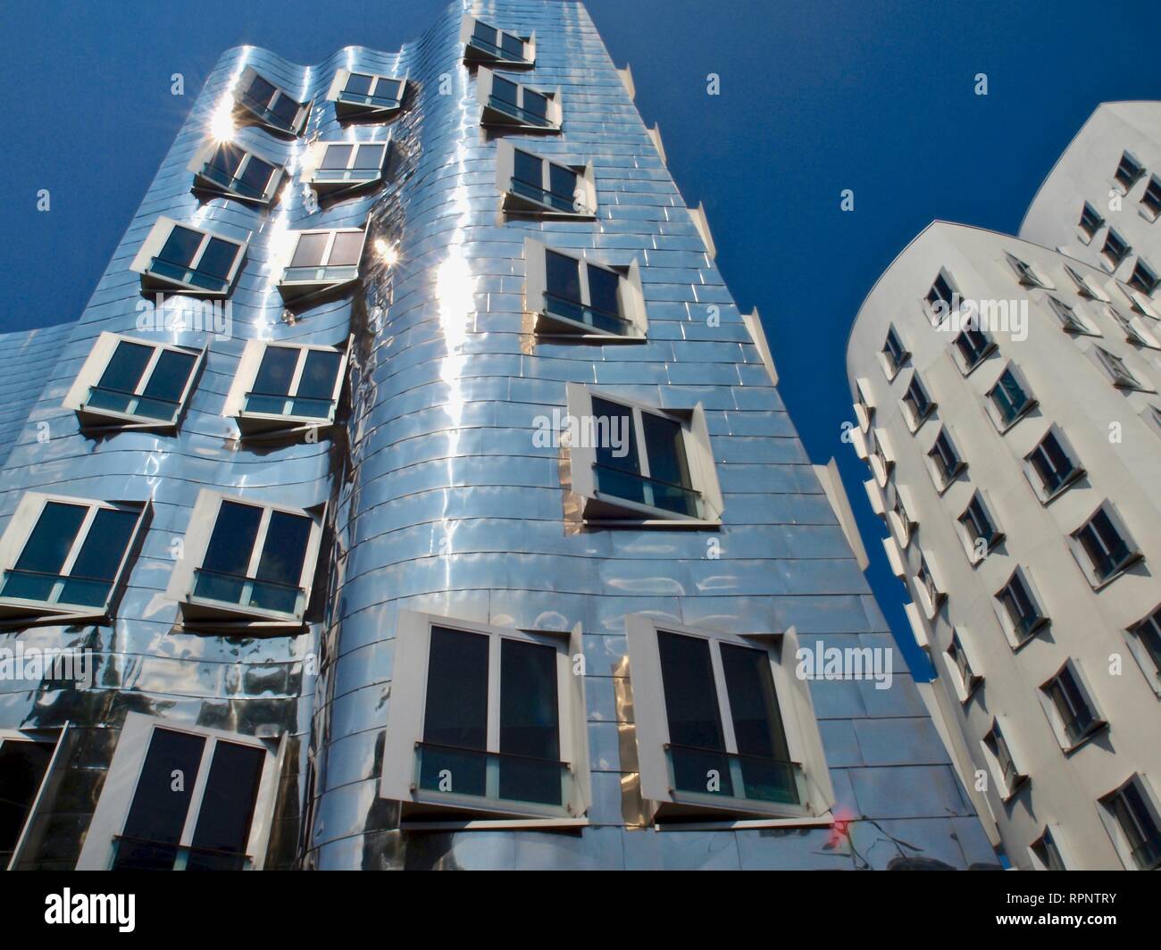 Silver Gehry building in Duesseldorf at the Media harbor, interesting ...