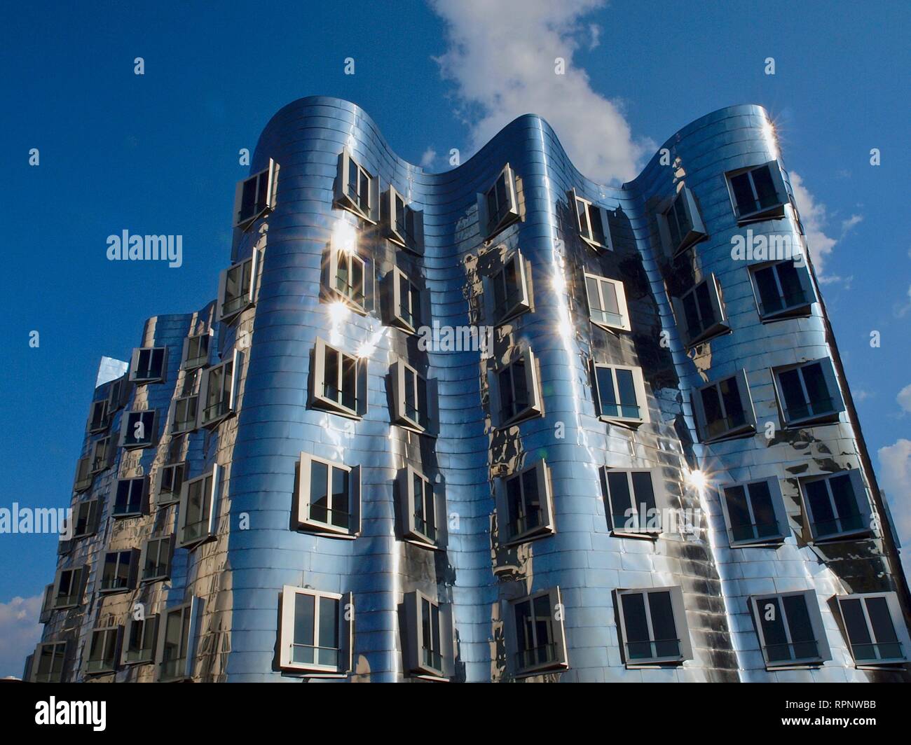 Silver Gehry building in Duesseldorf at the Media harbor, interesting ...